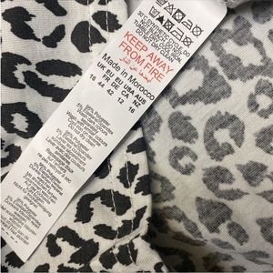 PrettyLittleThing | Tops | White Jersey Leopard Print Racer Crop Top ...